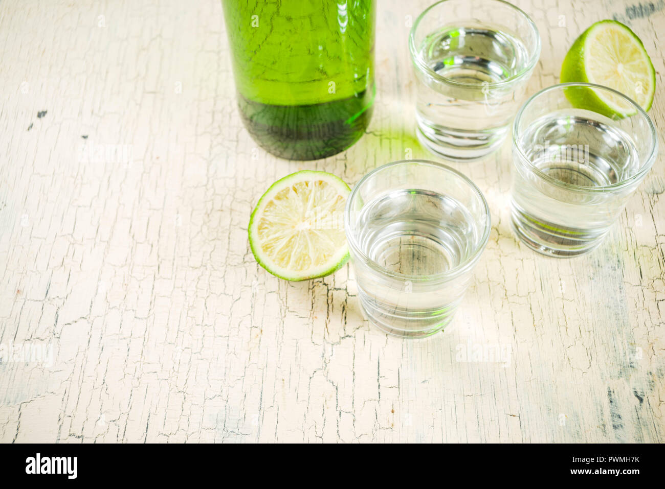 Traditional korean alcohol drink soju on light concrete background copy ...