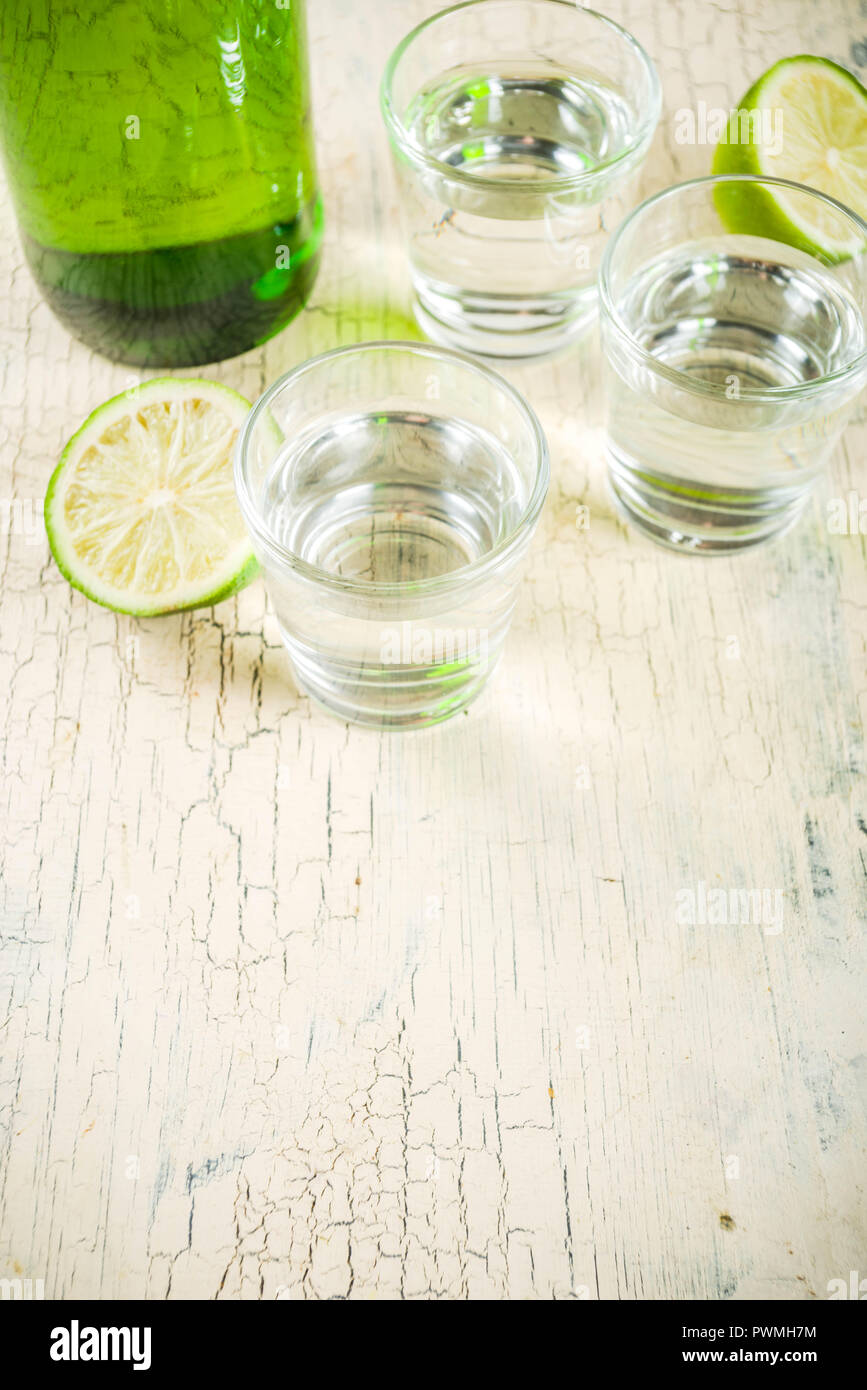 Traditional korean alcohol drink soju on light concrete background copy ...