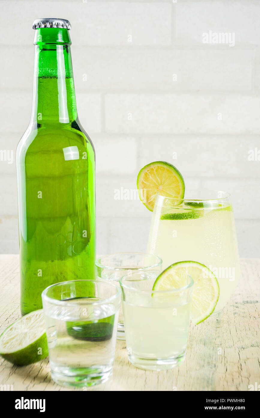 Traditional korean alcohol drink soju with soju-lime cocktails on light ...