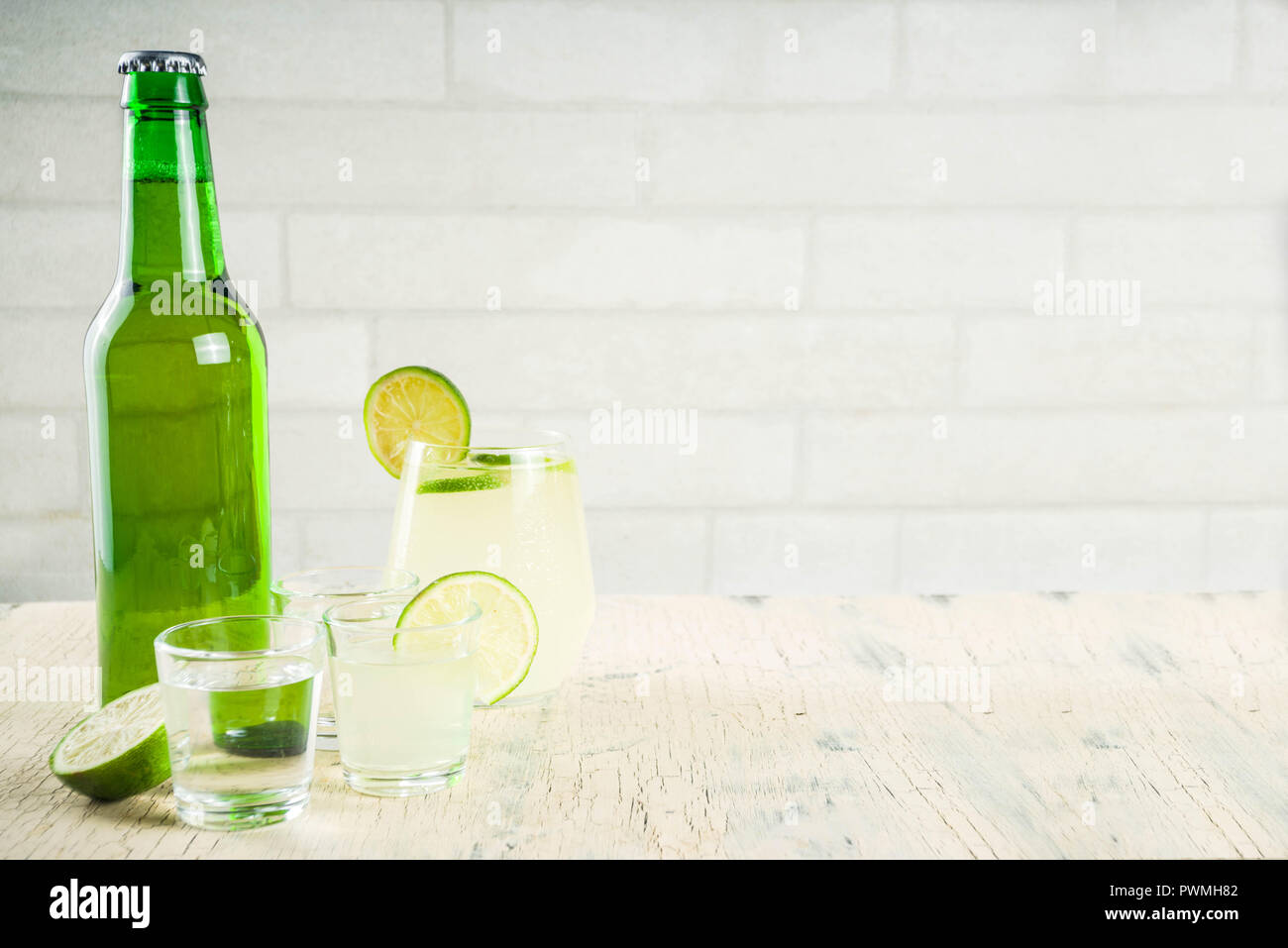 Traditional korean alcohol drink soju with soju-lime cocktails on light ...
