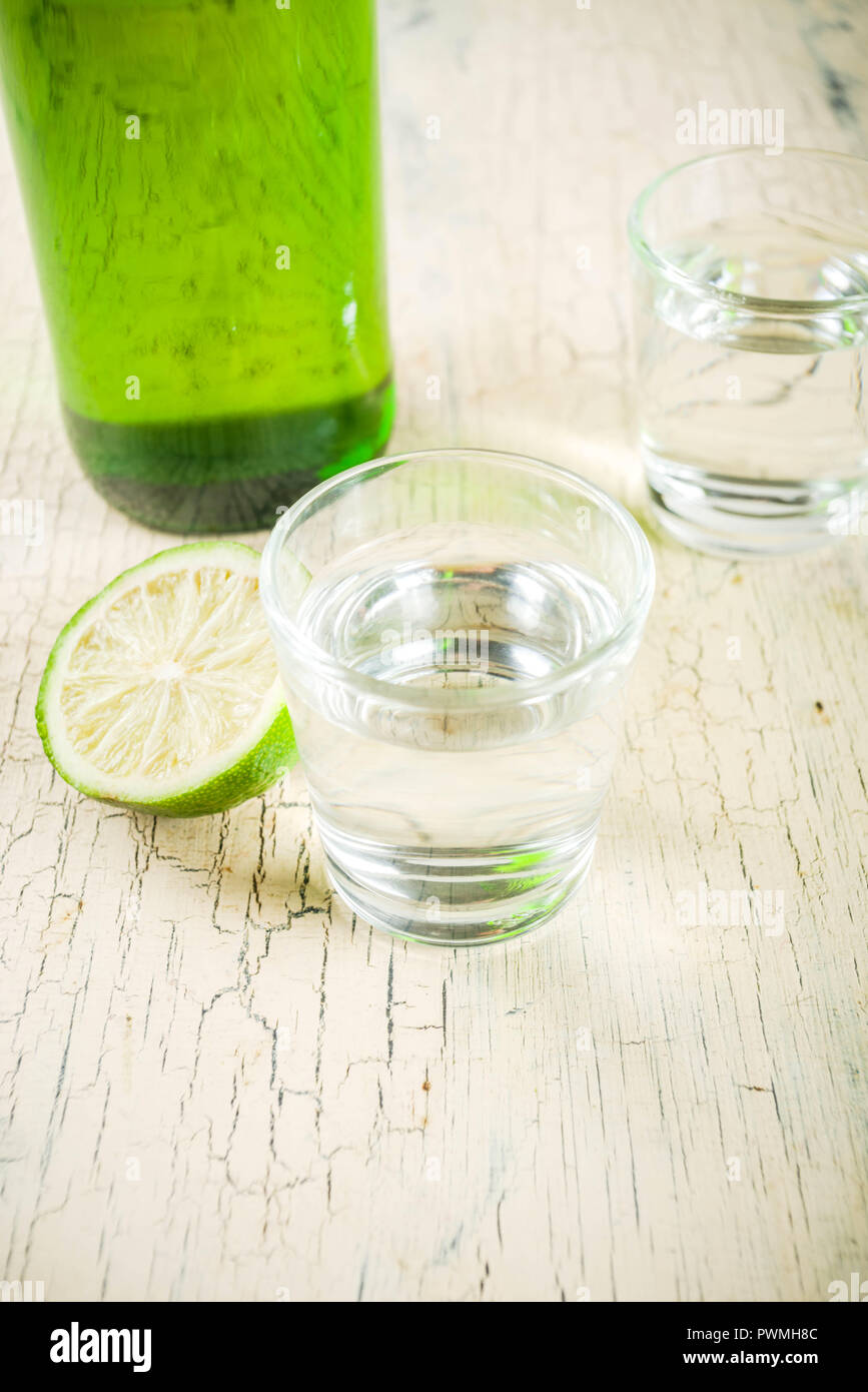 Traditional korean alcohol drink soju on light concrete background copy ...