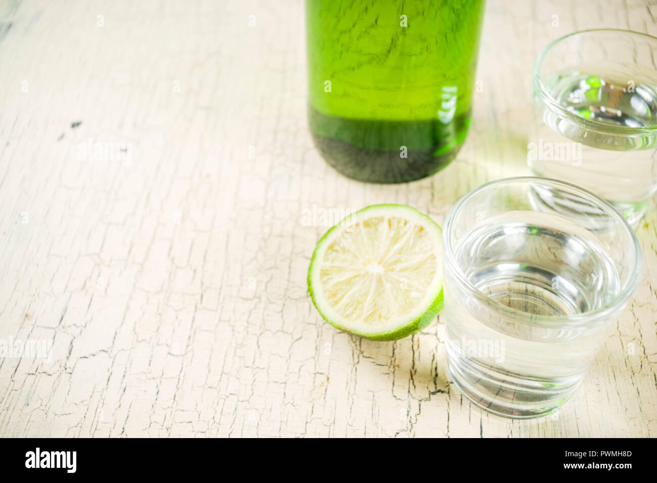 Traditional korean alcohol drink soju on light concrete background copy ...