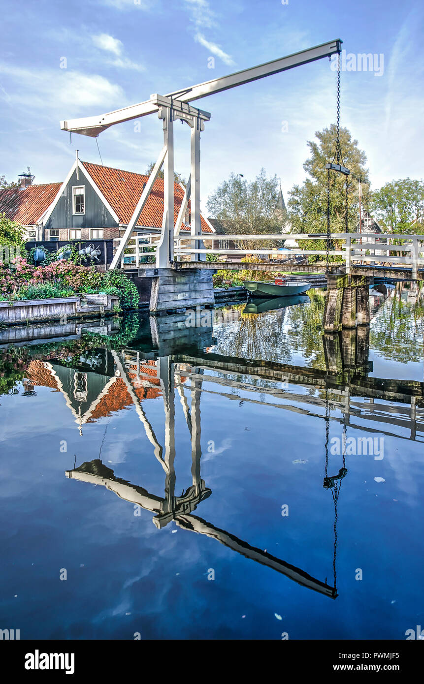 Edam, The Netherlands, October 7, 2018: White wooden drawbridge, houses ...