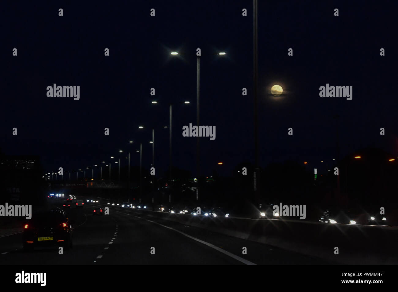 Motorway traffic at night Stock Photo - Alamy