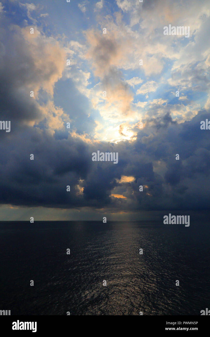 Ocean and grey clouds Stock Photo - Alamy