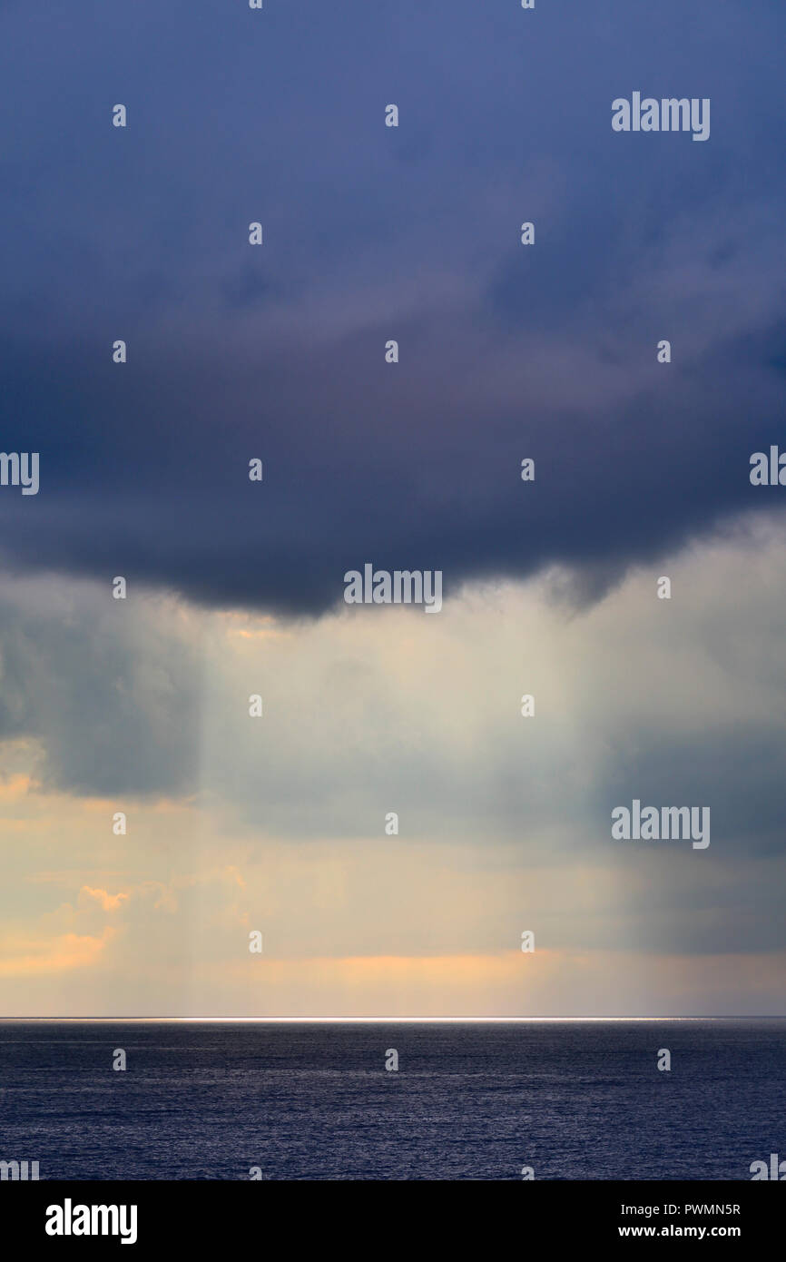 Ocean and grey clouds Stock Photo - Alamy