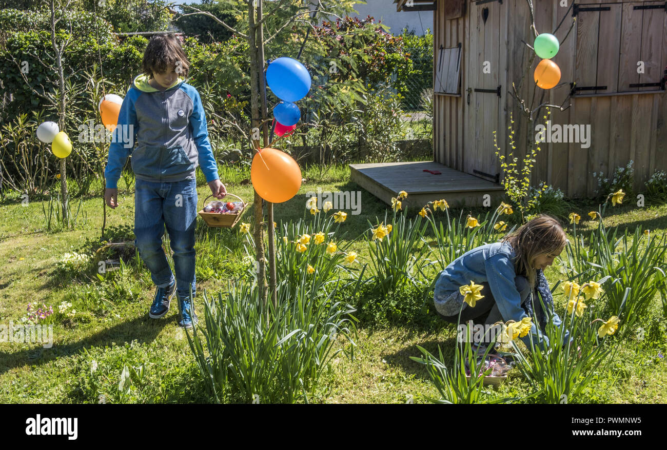 France, Easter, chocolate egg hunt in a garden Stock Photo - Alamy
