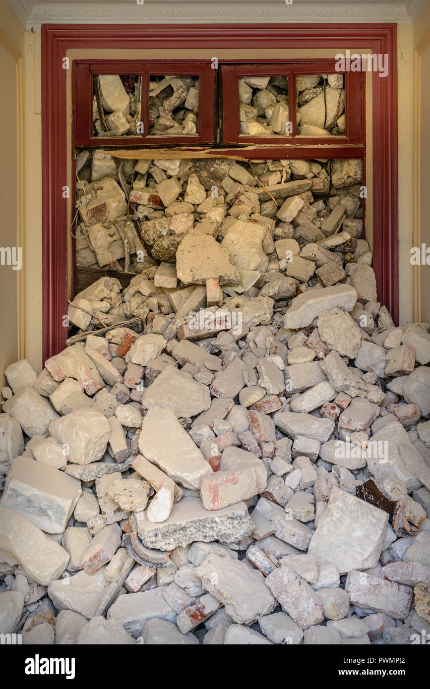 Accumulation of rubbles in the front entrance of a building being ...