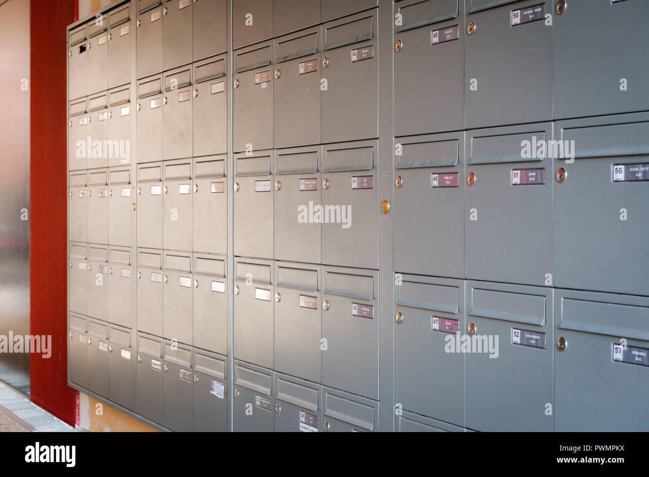 Letter boxes in a new building Stock Photo - Alamy