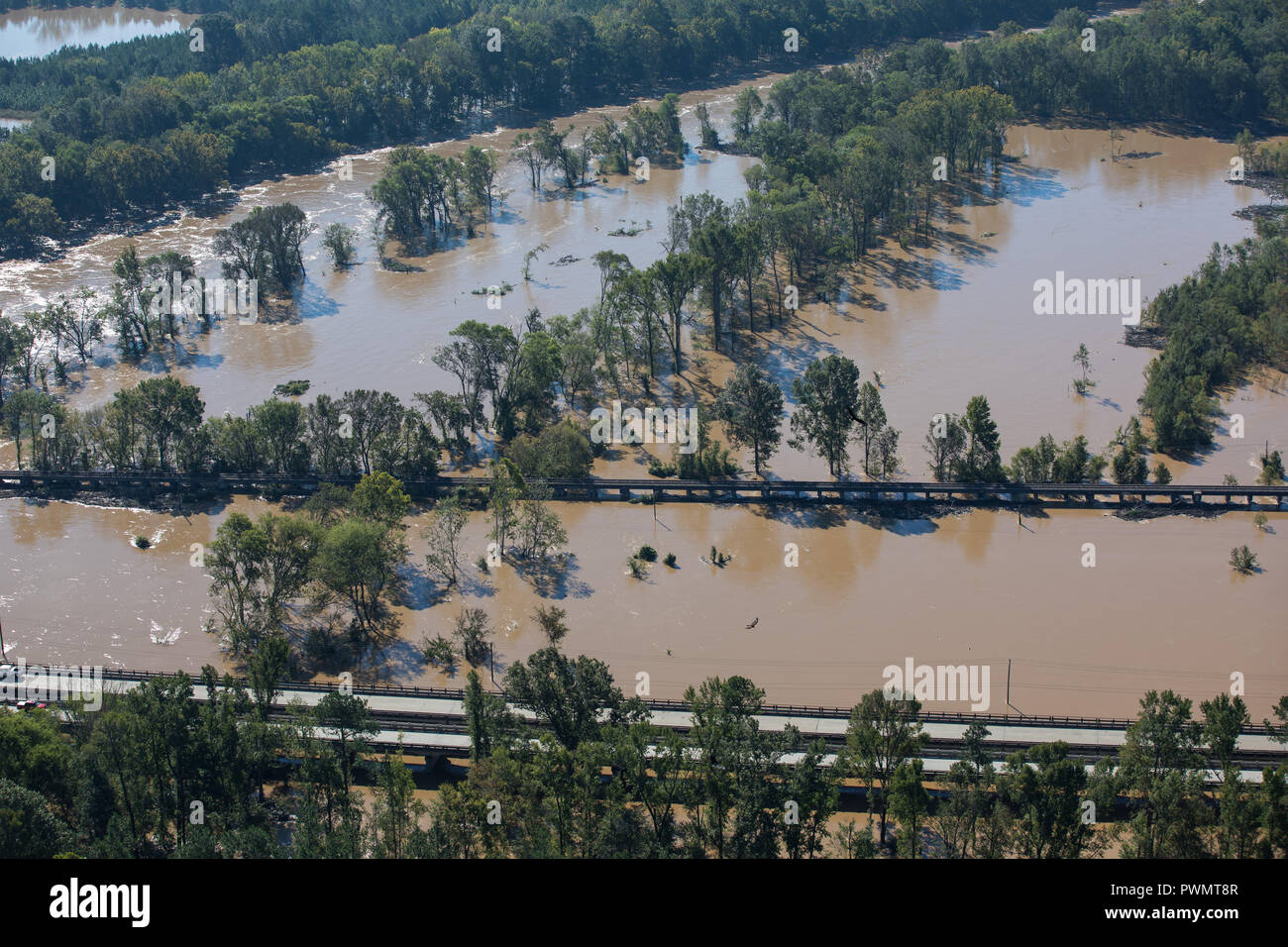Flood waters overwhelm roads and farms along the Waccamaw River in the ...
