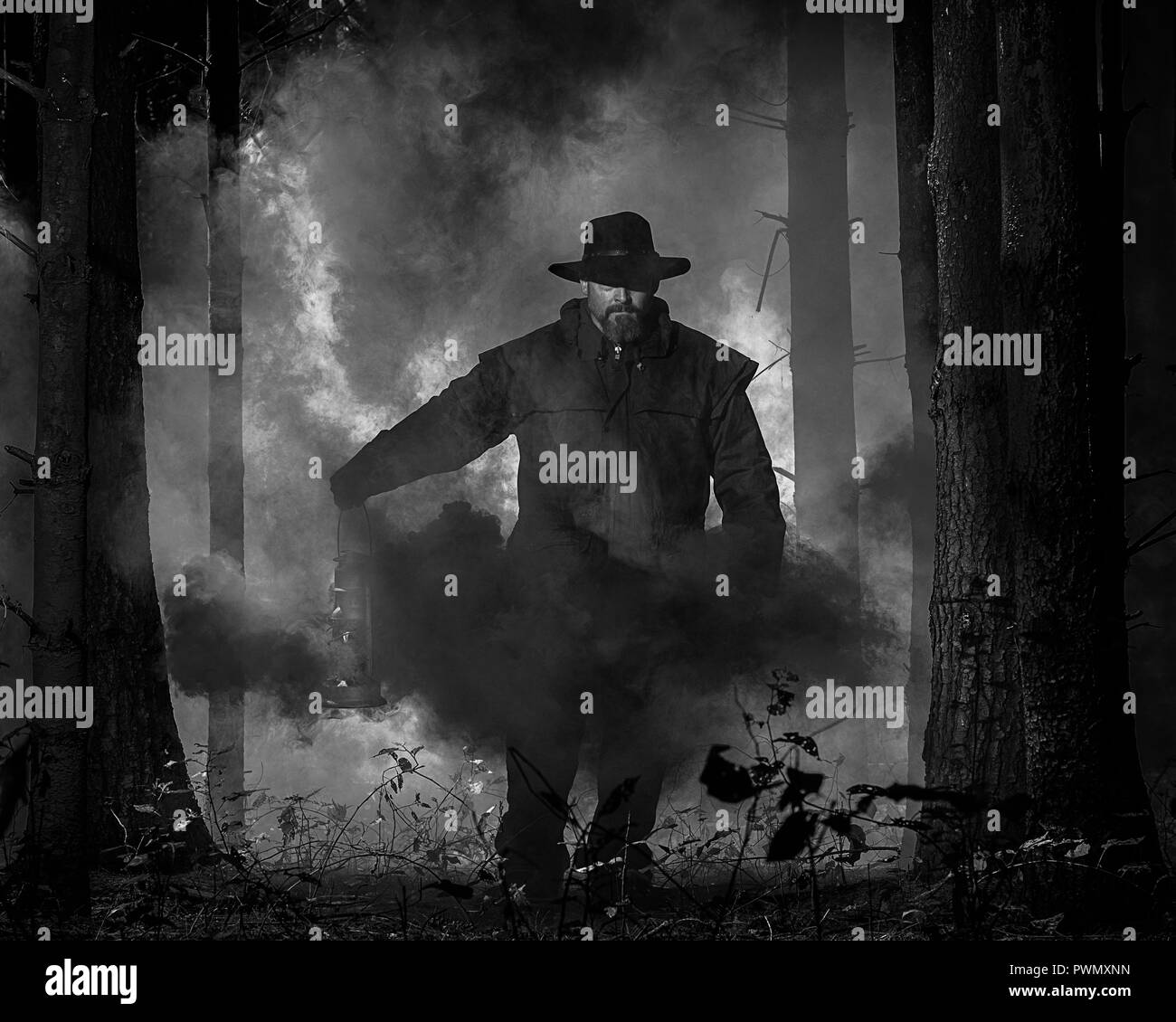 the cowboy in the forest Stock Photo - Alamy