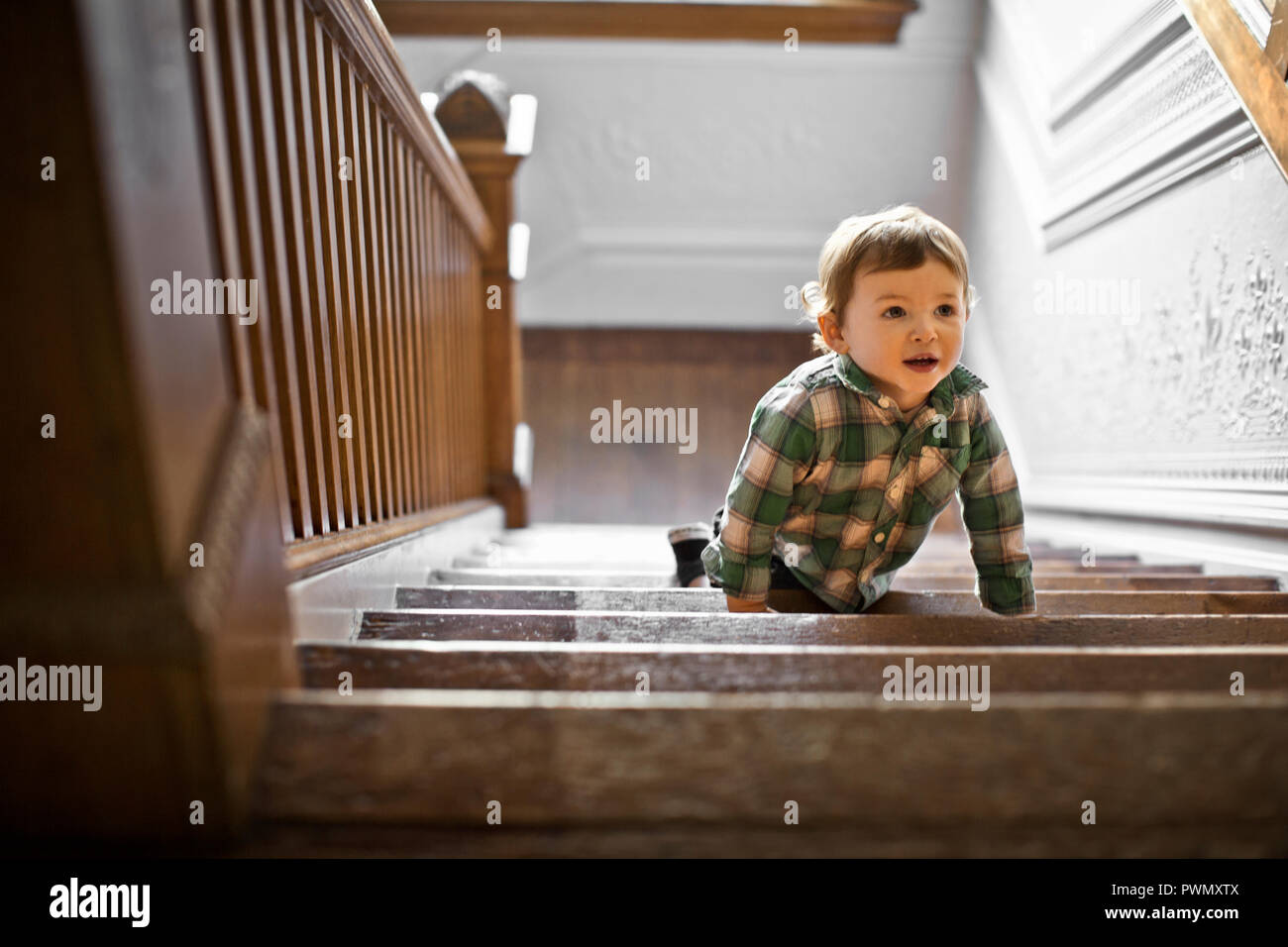 Toddler climbing steps hi-res stock photography and images - Alamy