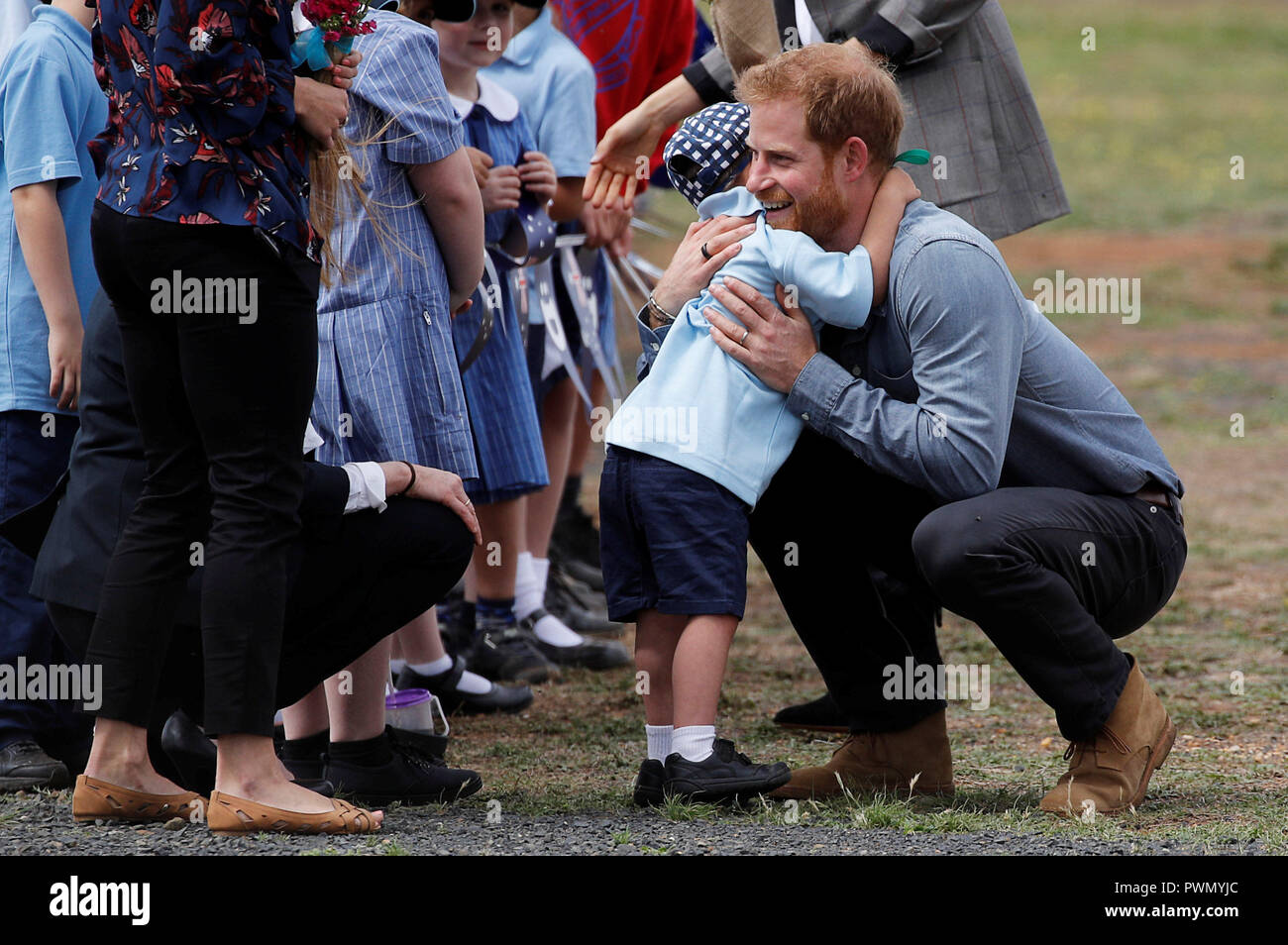 The Duke of Sussex hugs Luke Vincent, 5, after arriving at Dubbo ...