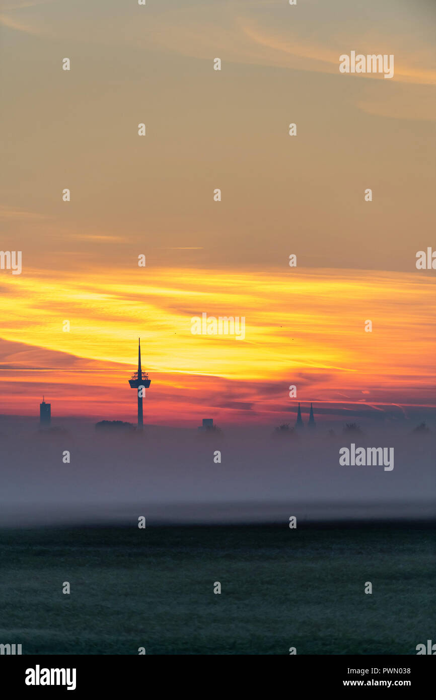 The Cologne television tower and skyline at sunrise Stock Photo - Alamy