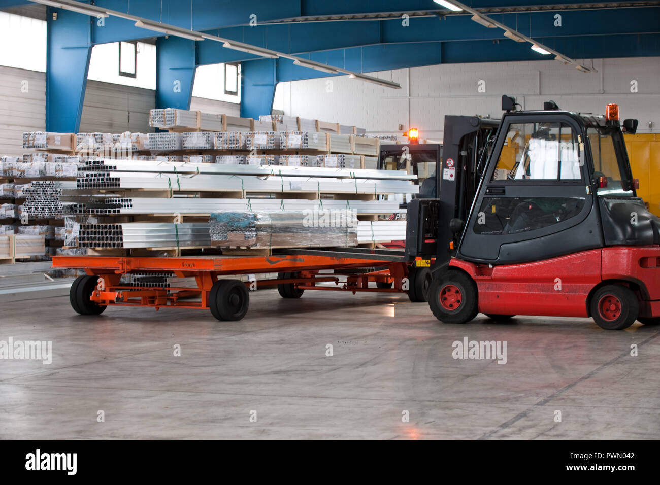 A forklift truck in a storage house at work Stock Photo - Alamy