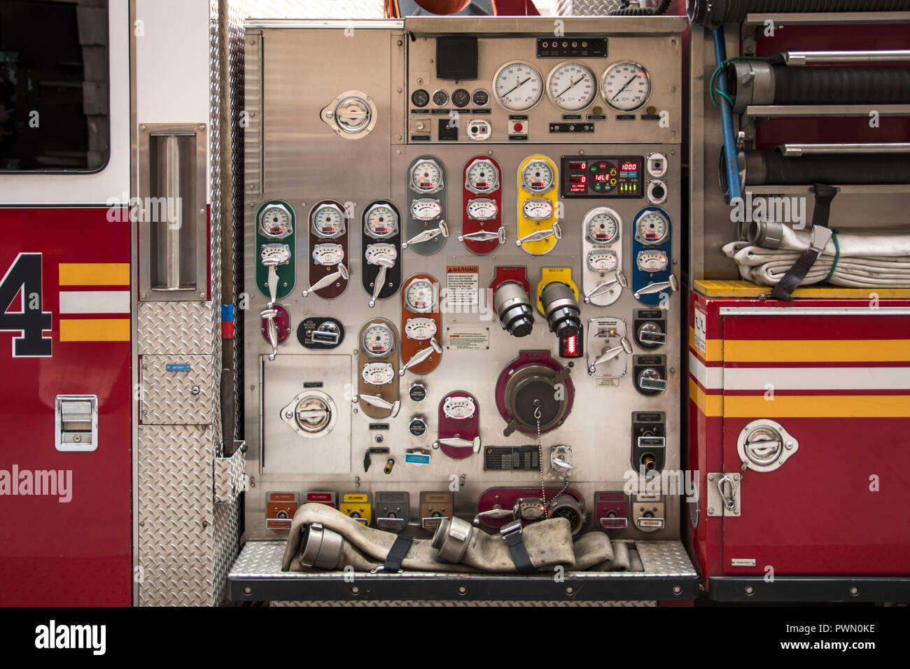 Firefighters control station with valves, meters, inlets and outlets on ...