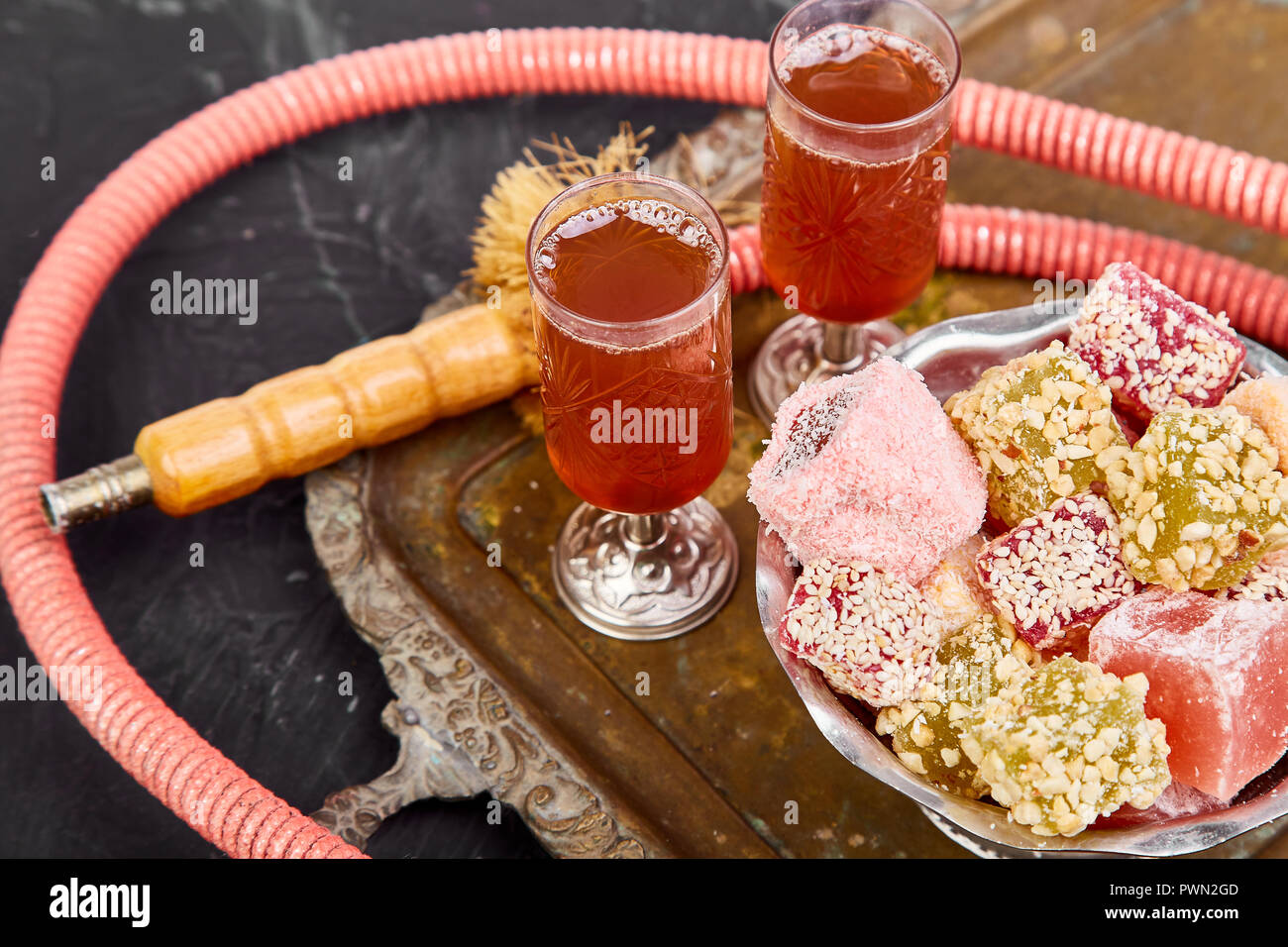 Set of various Turkish delight in traditional silver bowl on metal tray ...
