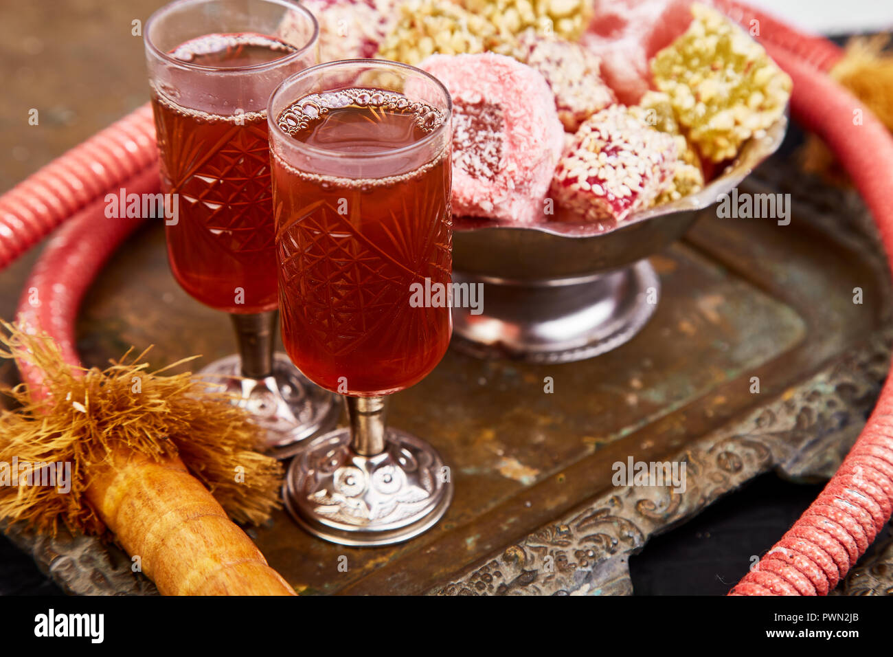 Set of various Turkish delight in traditional silver bowl on metal tray ...