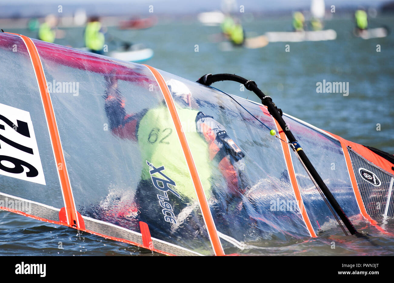 wind surfers getting ready for a race Stock Photo - Alamy