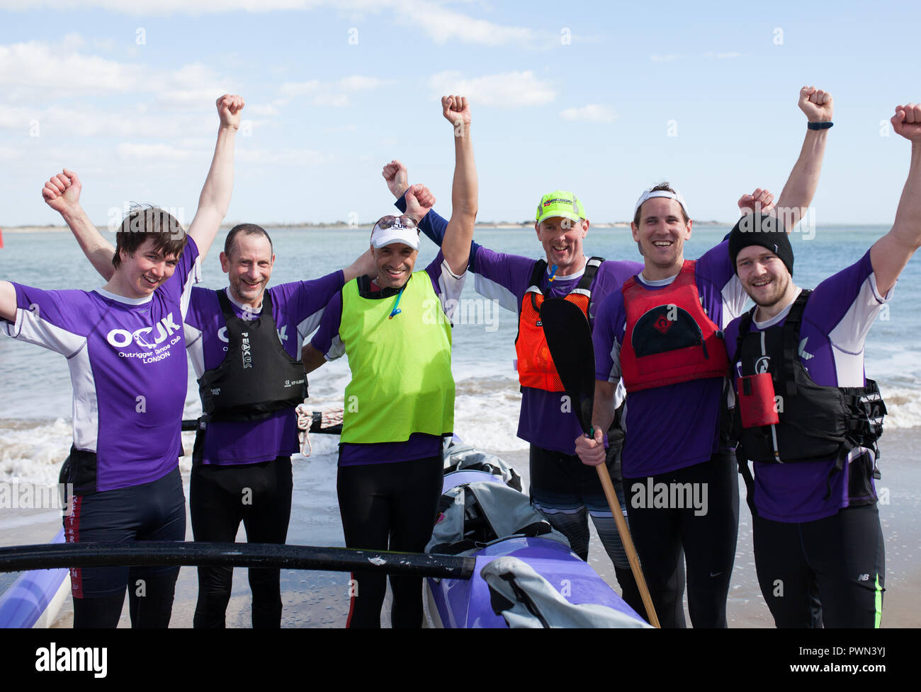Group portrait of winners of a dragon boat race Stock Photo - Alamy
