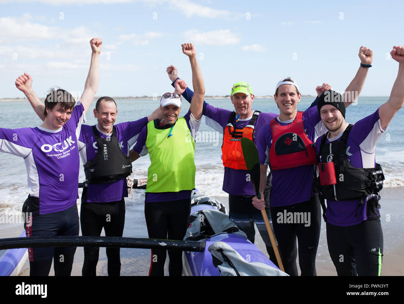Group portrait of winners of a dragon boat race Stock Photo - Alamy