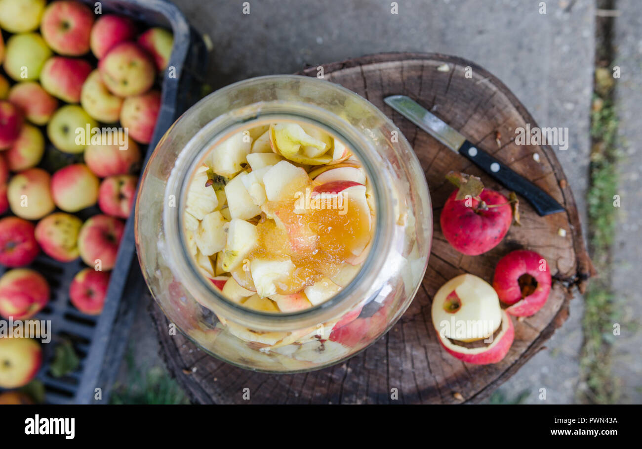 Making of apple - from above scene of a working station Stock Photo - Alamy