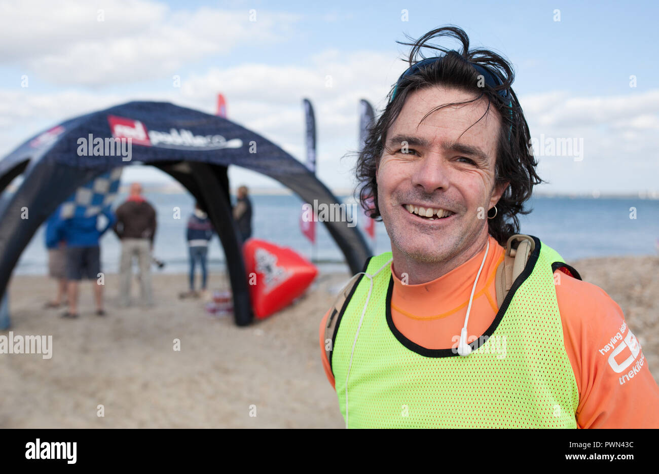 Portrait of a man after a paddle board race Stock Photo - Alamy