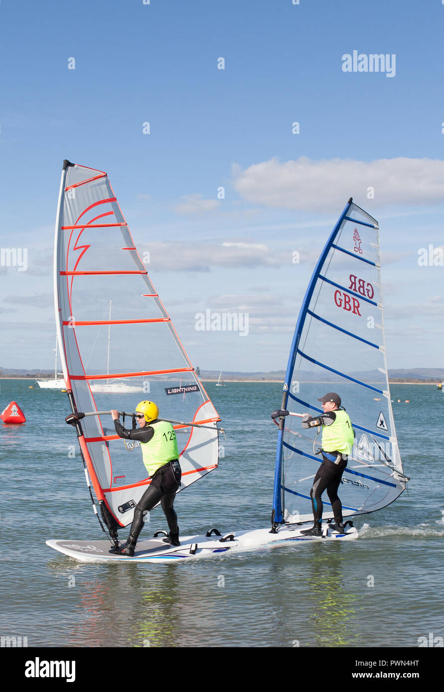 Tandem wind surfers finishing a race Stock Photo - Alamy