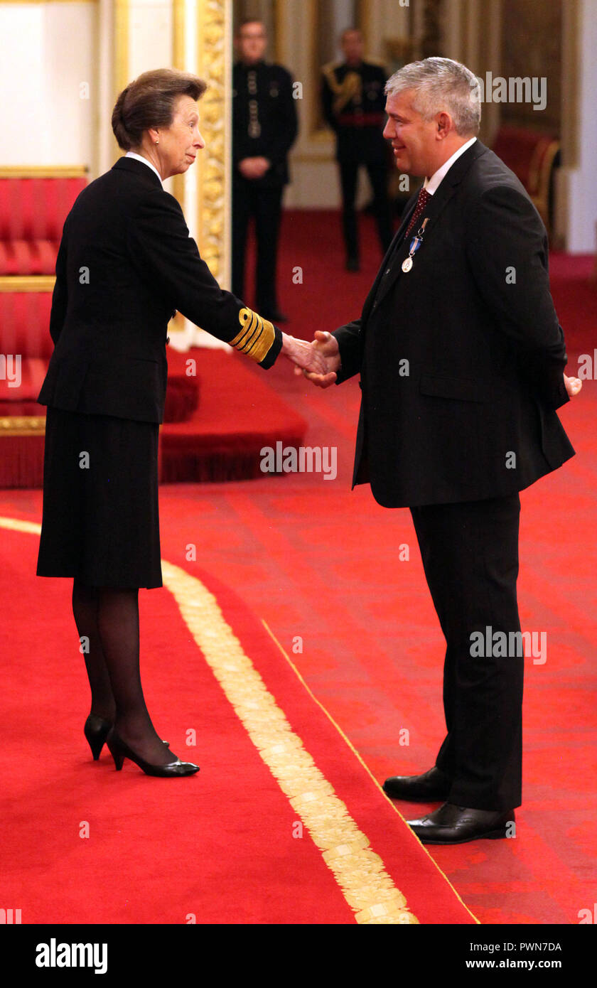 Stephen Adams is decorated with the Queen's Gallantry Medal by the ...