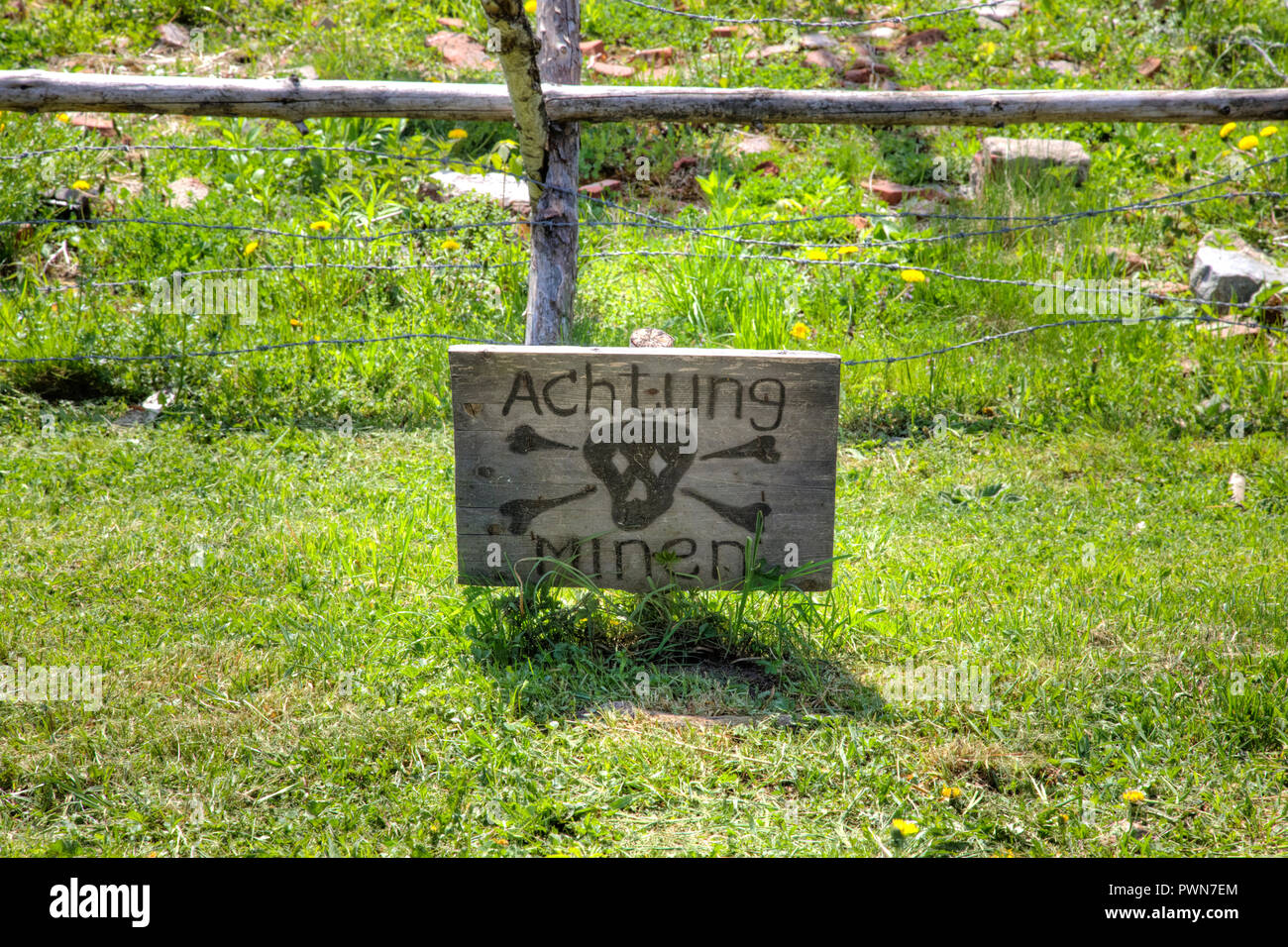 Warning sign, passage closed, minefiel Stock Photo - Alamy