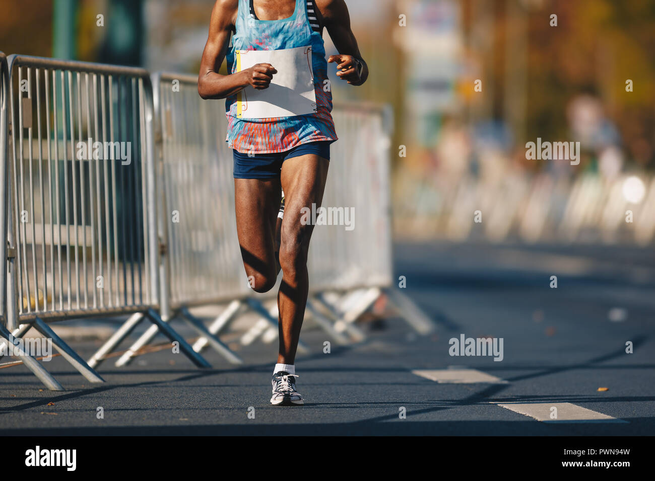 African woman running on street hi-res stock photography and images - Alamy