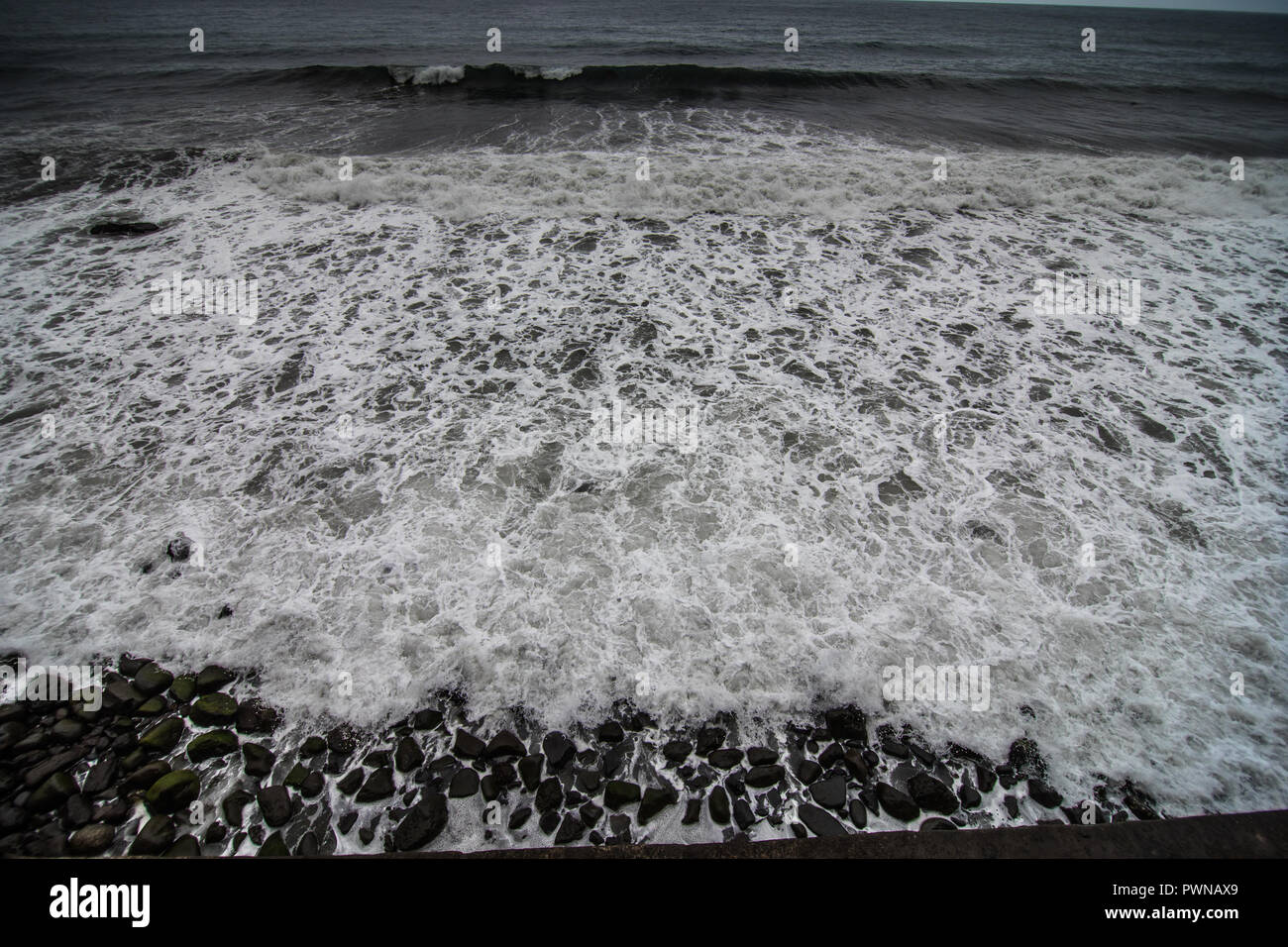 Ocean waves on Madeira Island beach Stock Photo - Alamy
