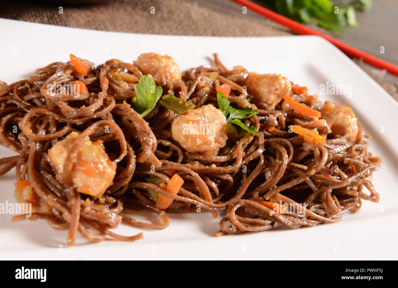 Japan saba noodles with chicken and vegetables Stock Photo - Alamy