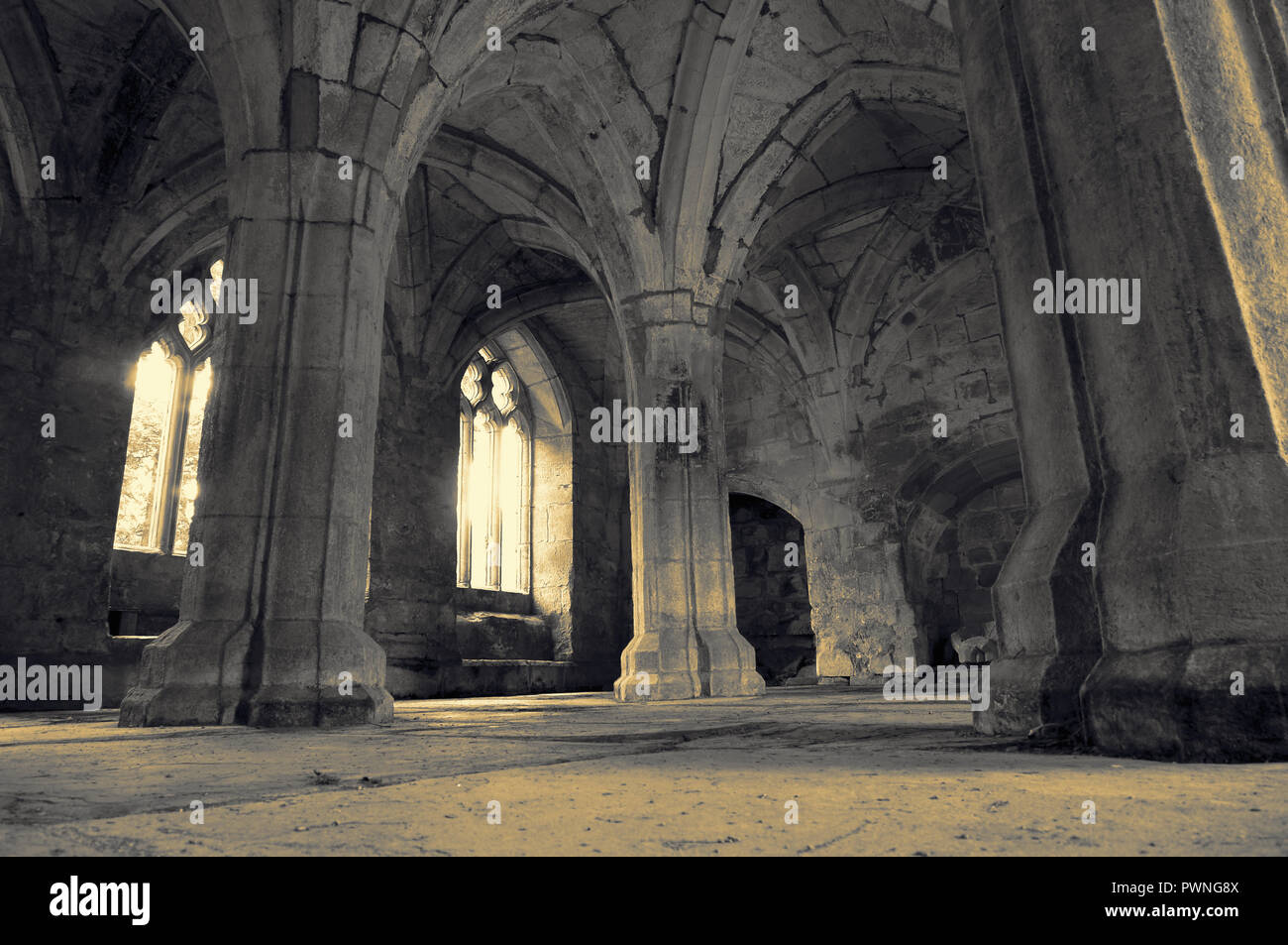 Abstract image of the interior of a medieval abbey with colour toning ...