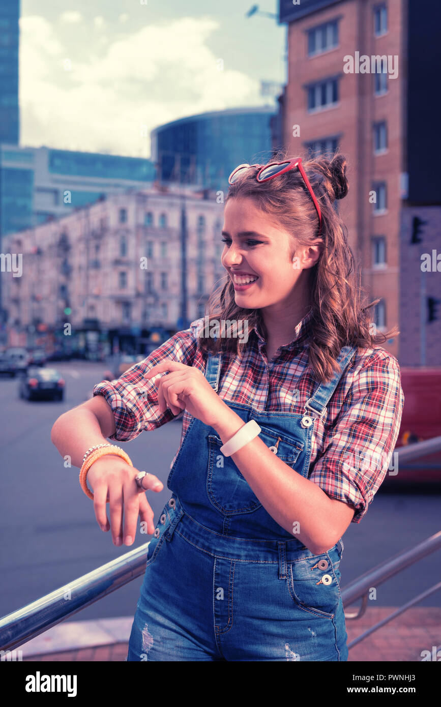 Beautiful emotional girl feeling happy while interacting with her ...