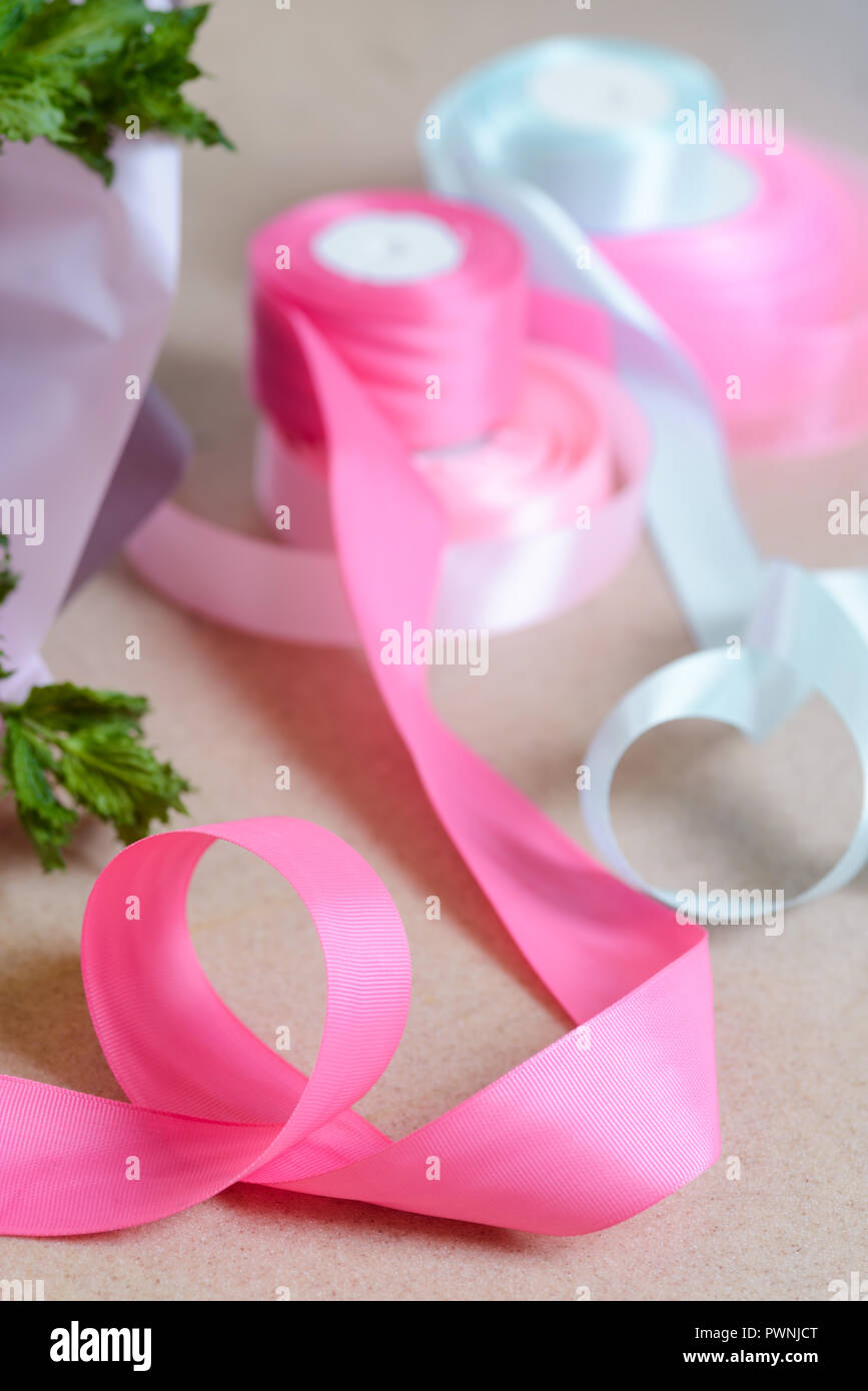 Pink and white ribbons Stock Photo - Alamy