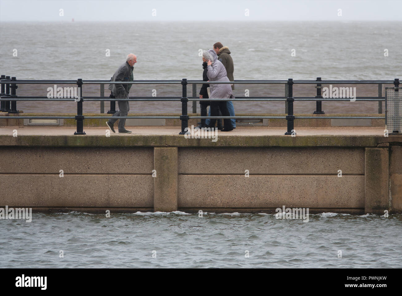 People walking windy day hi-res stock photography and images - Alamy