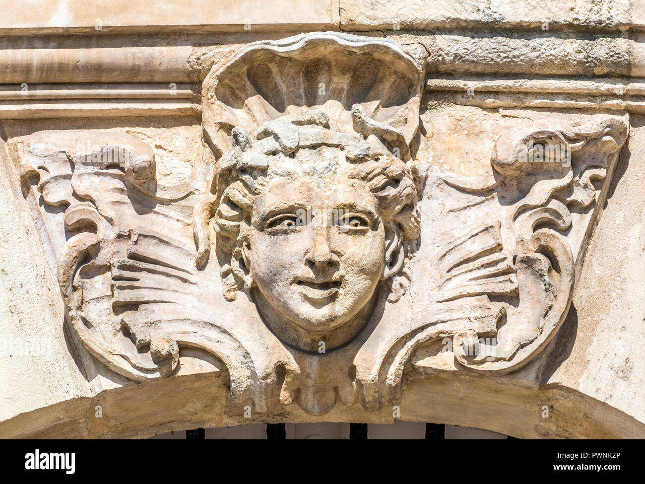 France, Gironde, Bordeaux, mascaron on the facade of a palace on the ...