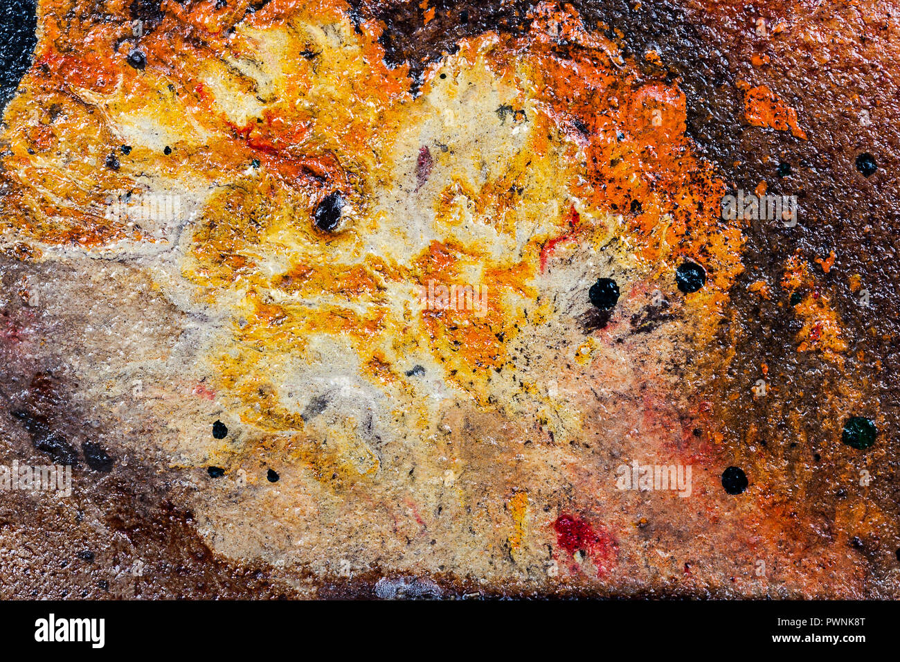 Yellow brown and red messy wall stucco texture background. Decorative ...