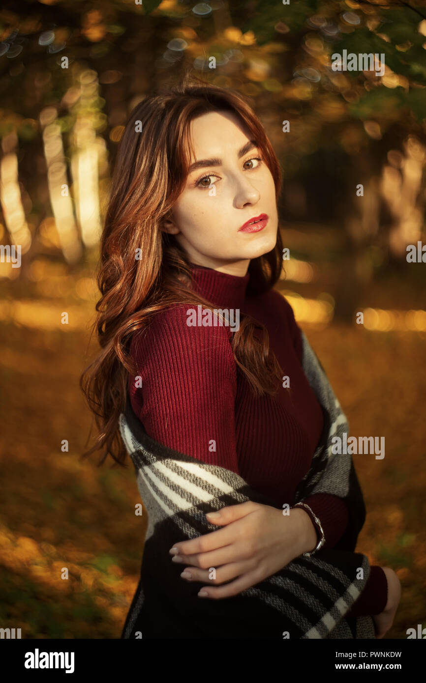 Sad girl in red scarf hi-res stock photography and images - Alamy