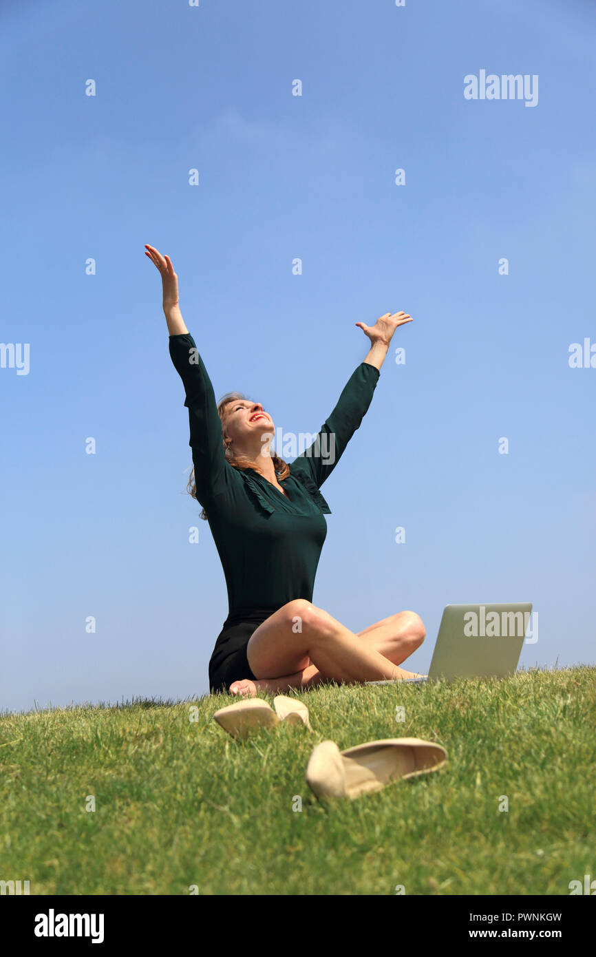 Young woman taking a break Stock Photo - Alamy