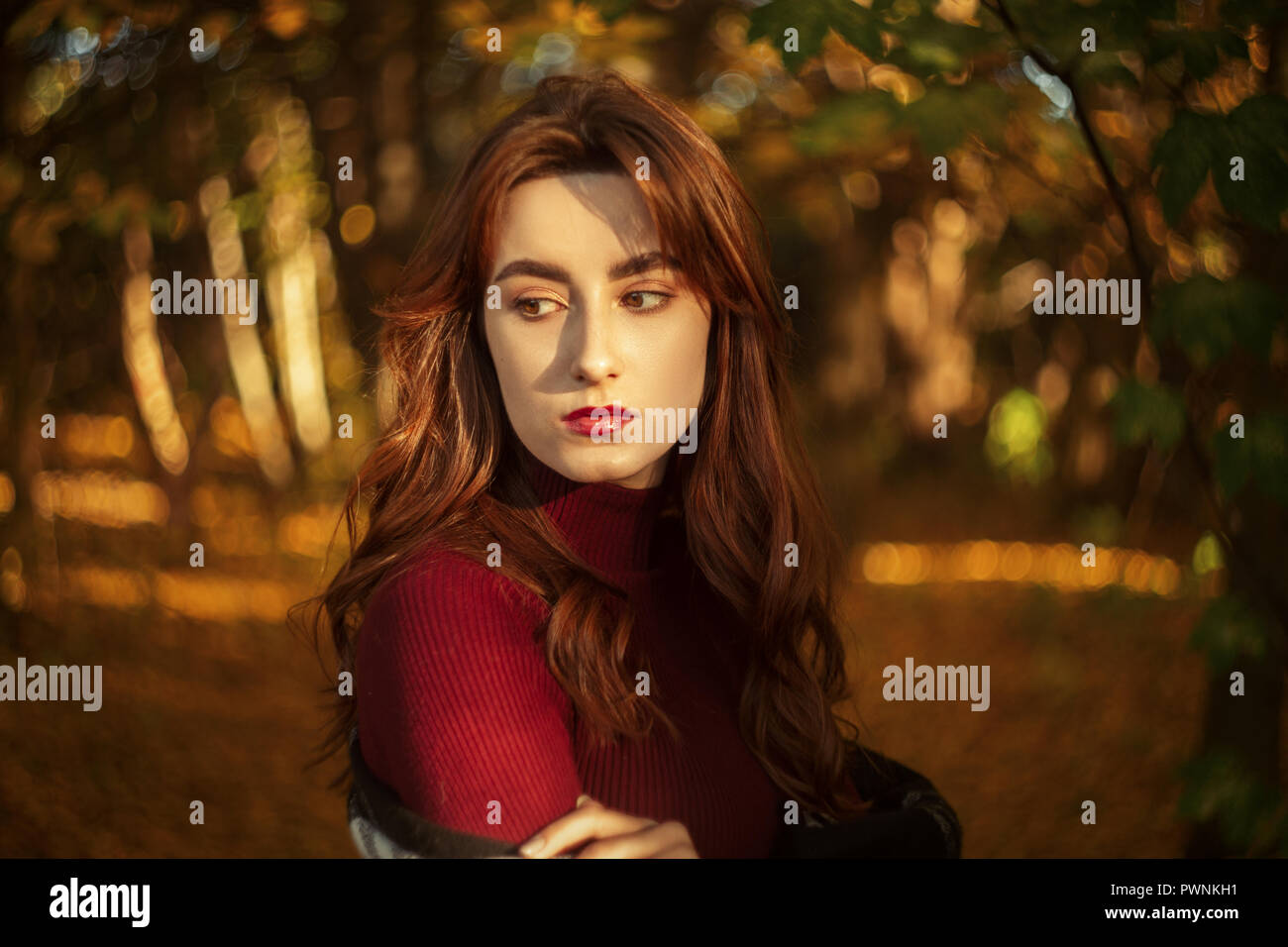 Sad girl in red scarf hi-res stock photography and images - Alamy