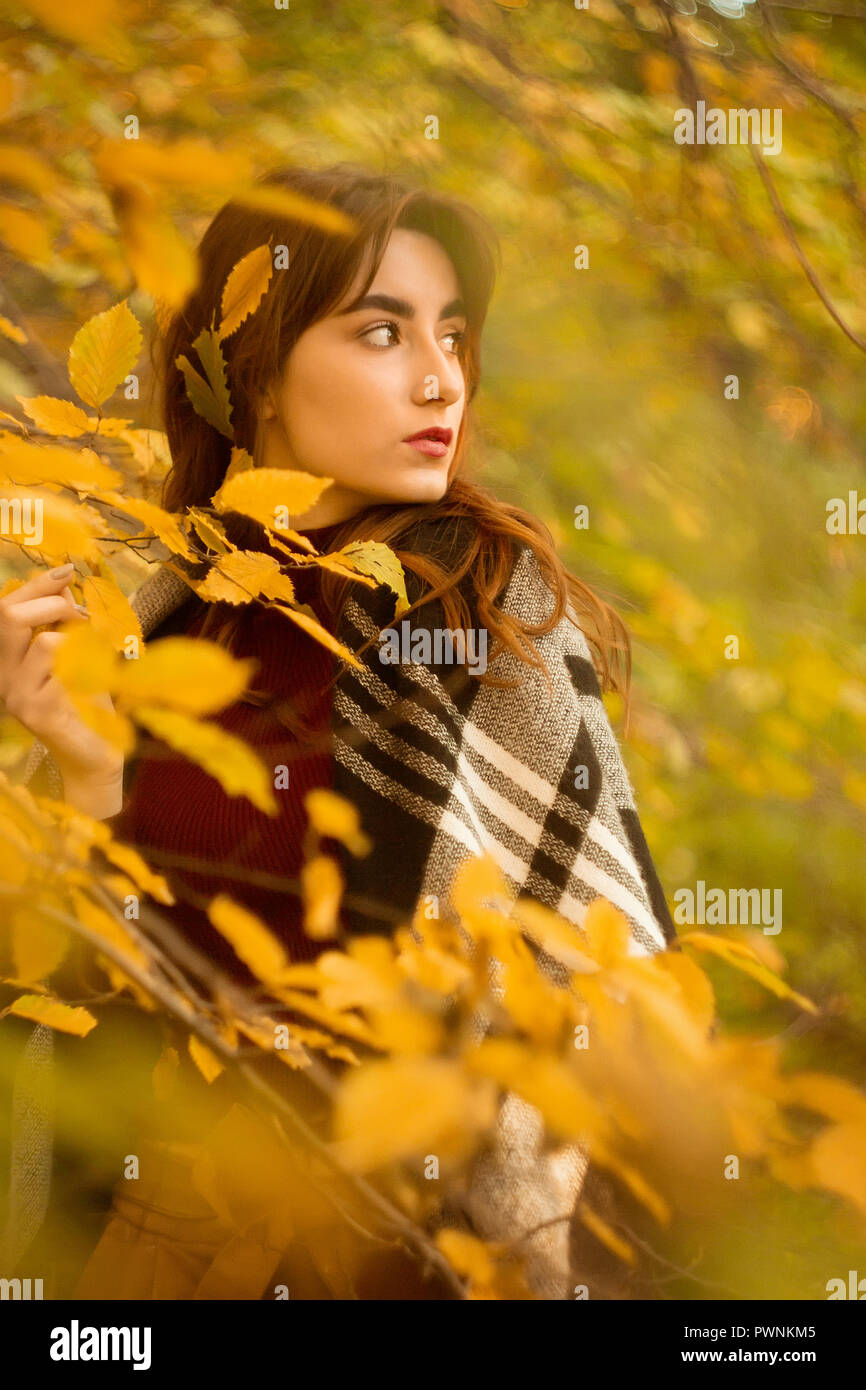 Sad girl in red scarf hi-res stock photography and images - Alamy