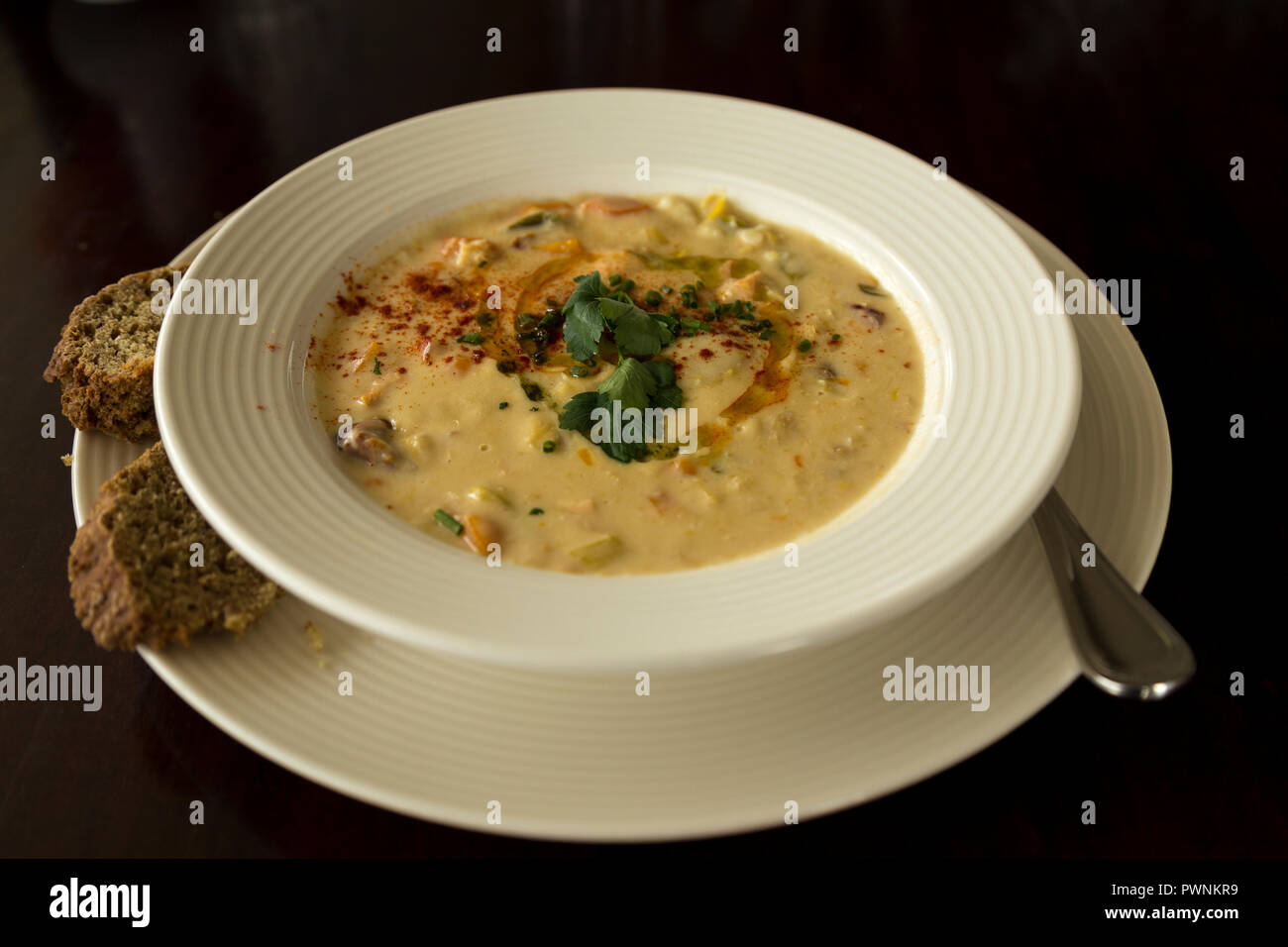 Bowl of Irish seafood chowder Stock Photo - Alamy