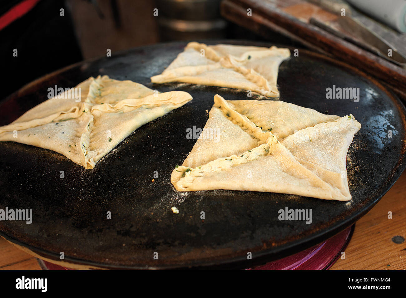 The process of cooking Cheburek. The Caucasian and eastern food ...