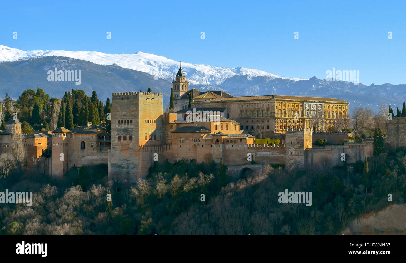 Granada Alhambra in Winter with snow covered mountains behind taken ...