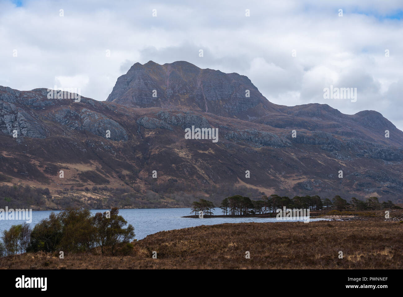 Loch Maree and the mountain Slioch on a cloudy day in spring, Wester ...