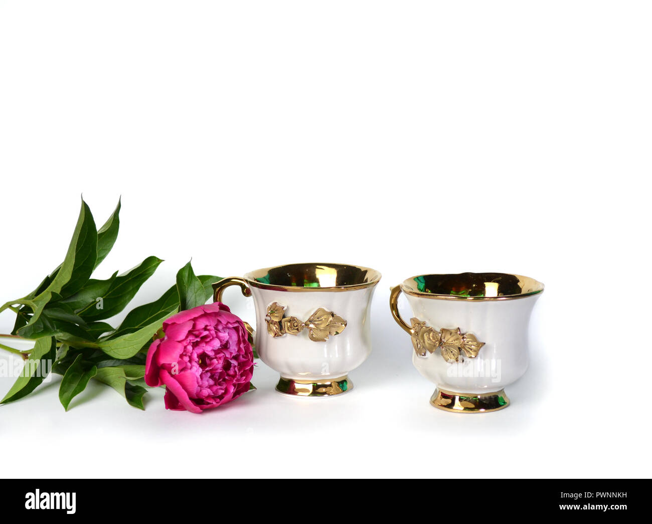 Gold teacup hi-res stock photography and images - Alamy