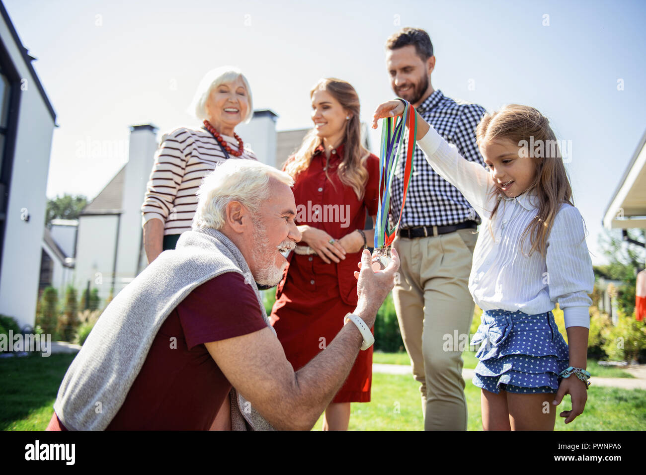 Grandparents and parents talking hi-res stock photography and images ...