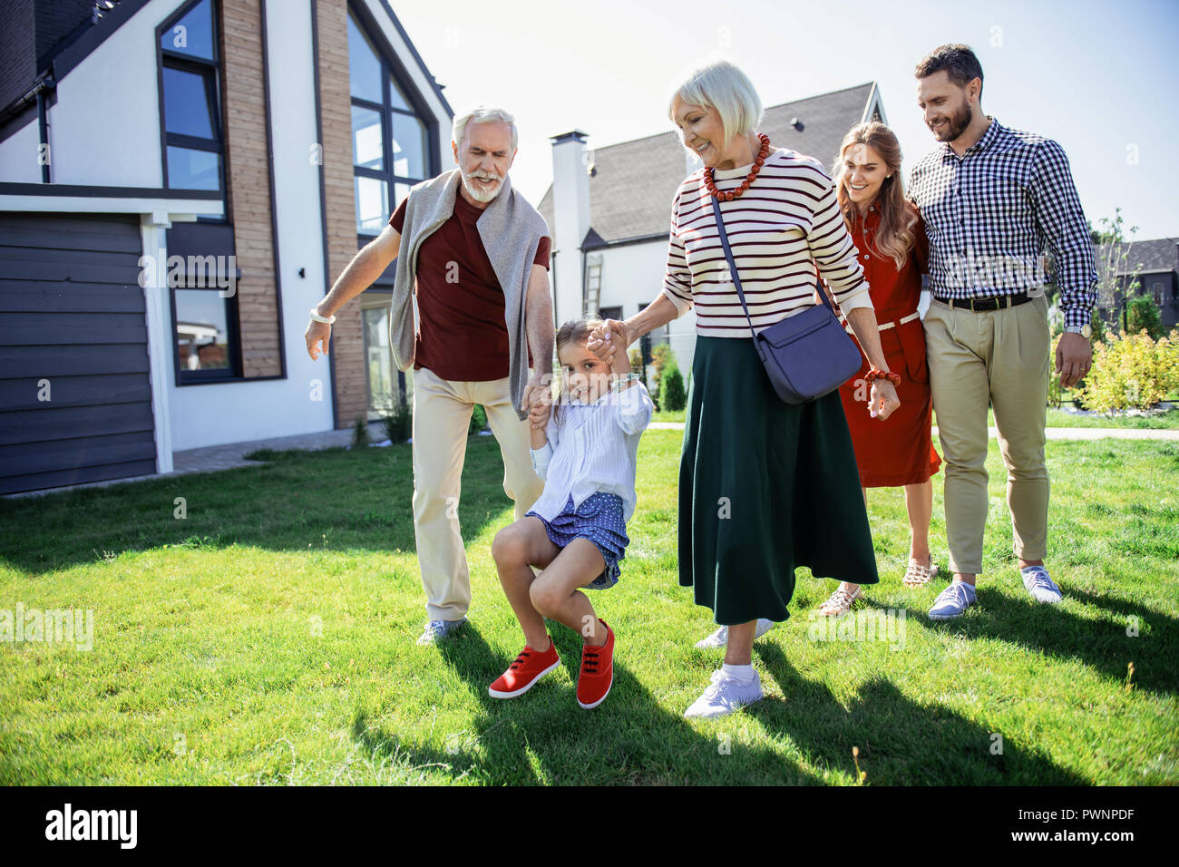 Positive delighted people spending time with pleasure Stock Photo - Alamy
